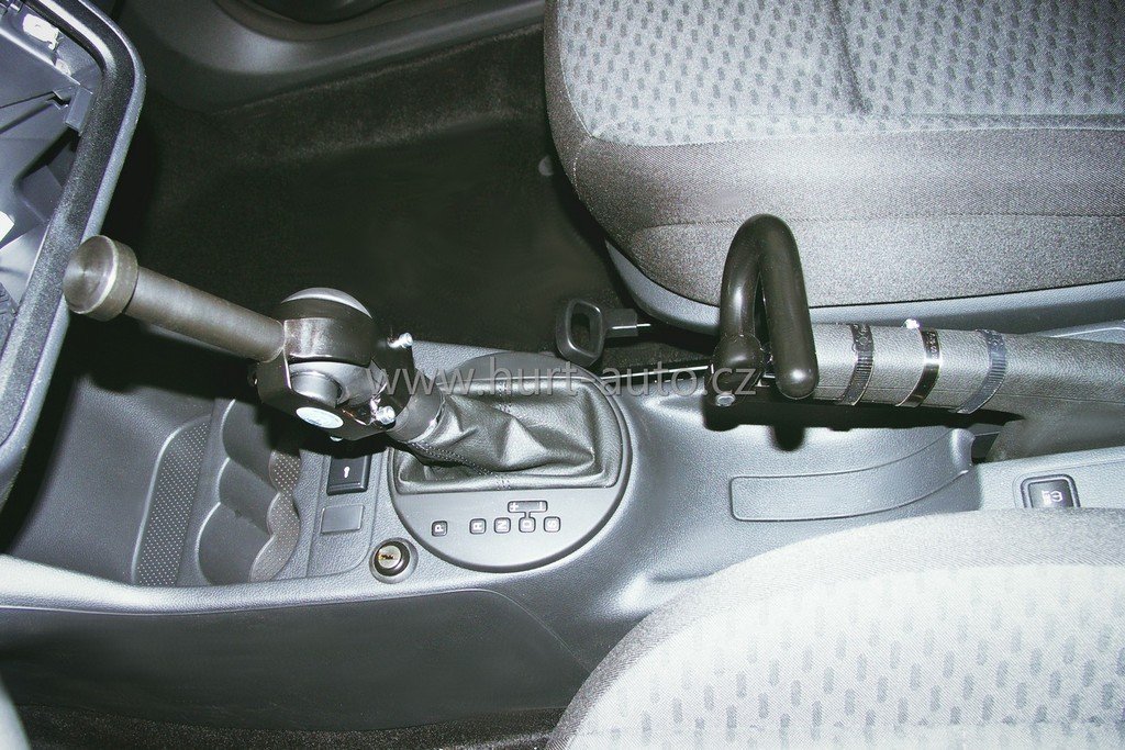 Gearshift attachment and handbrake attachment